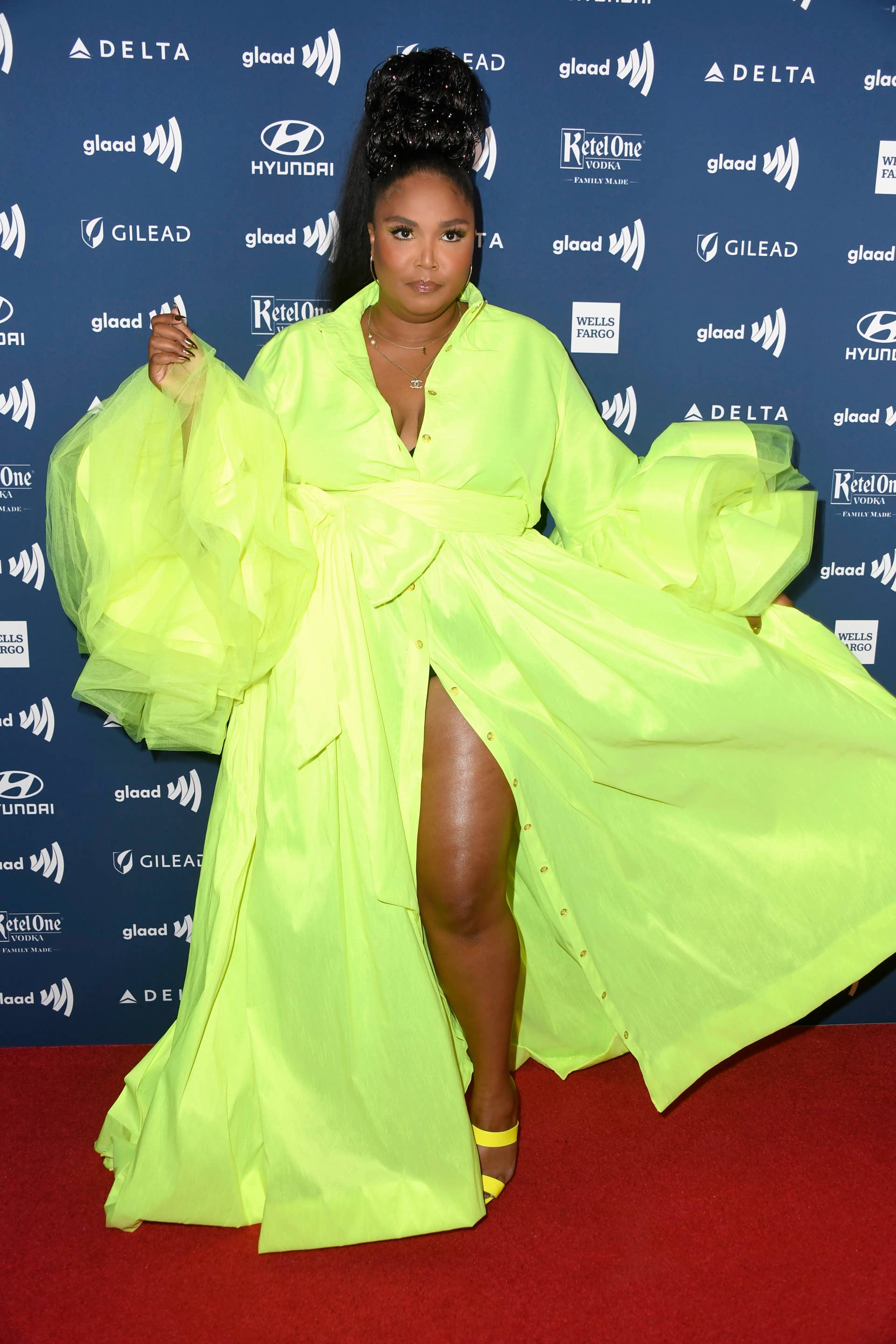 Great Outfits in Fashion History: Lizzo in Neon Green Christopher John ...