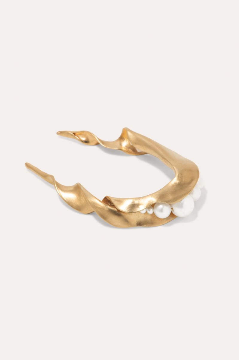 Meet the French Pin, the Claw Clip's Chic Older Sister - Fashionista