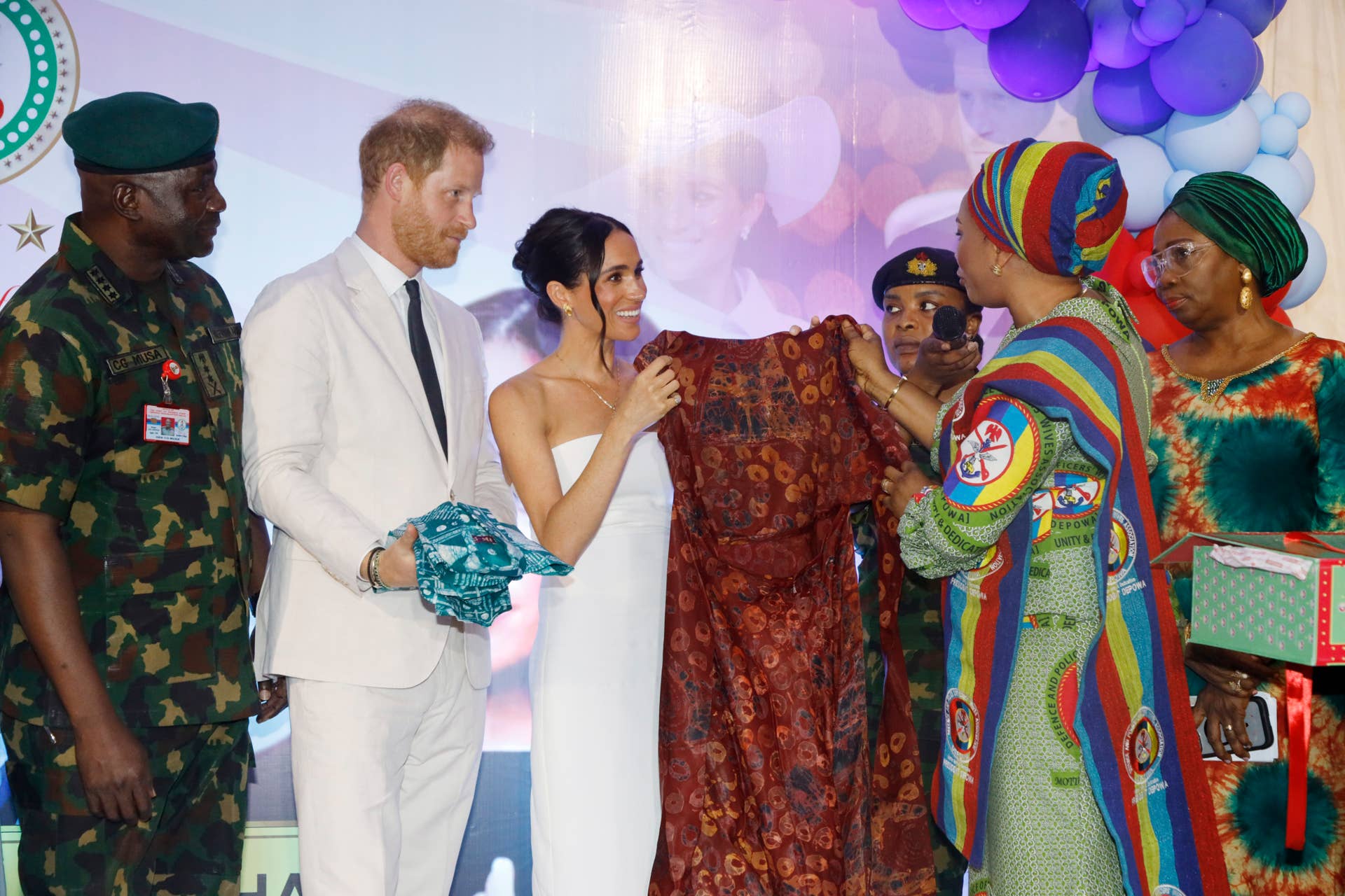 Everything Meghan Markle Wore on Her Tour of Nigeria - Fashionista