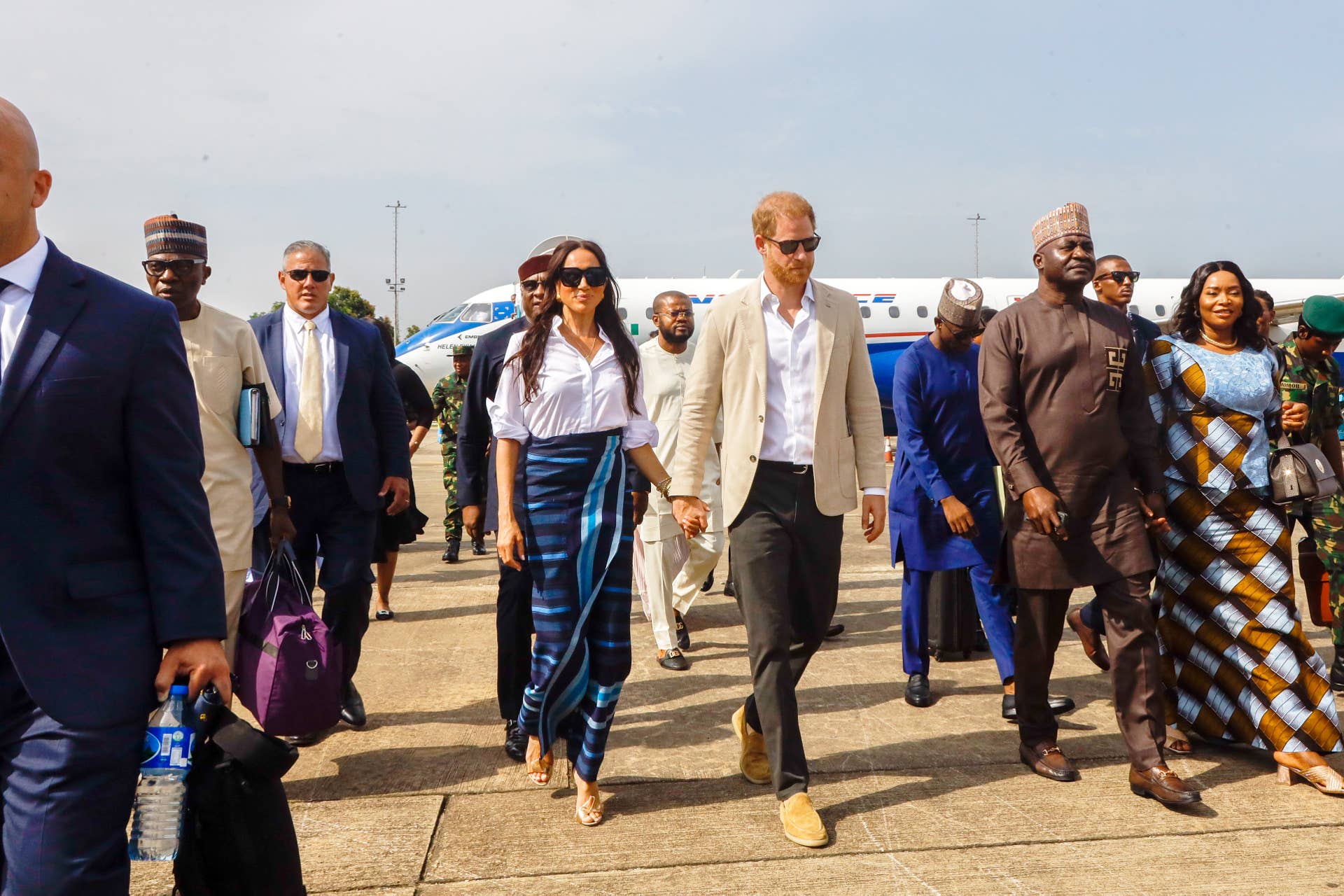 Everything Meghan Markle Wore on Her Tour of Nigeria - Fashionista