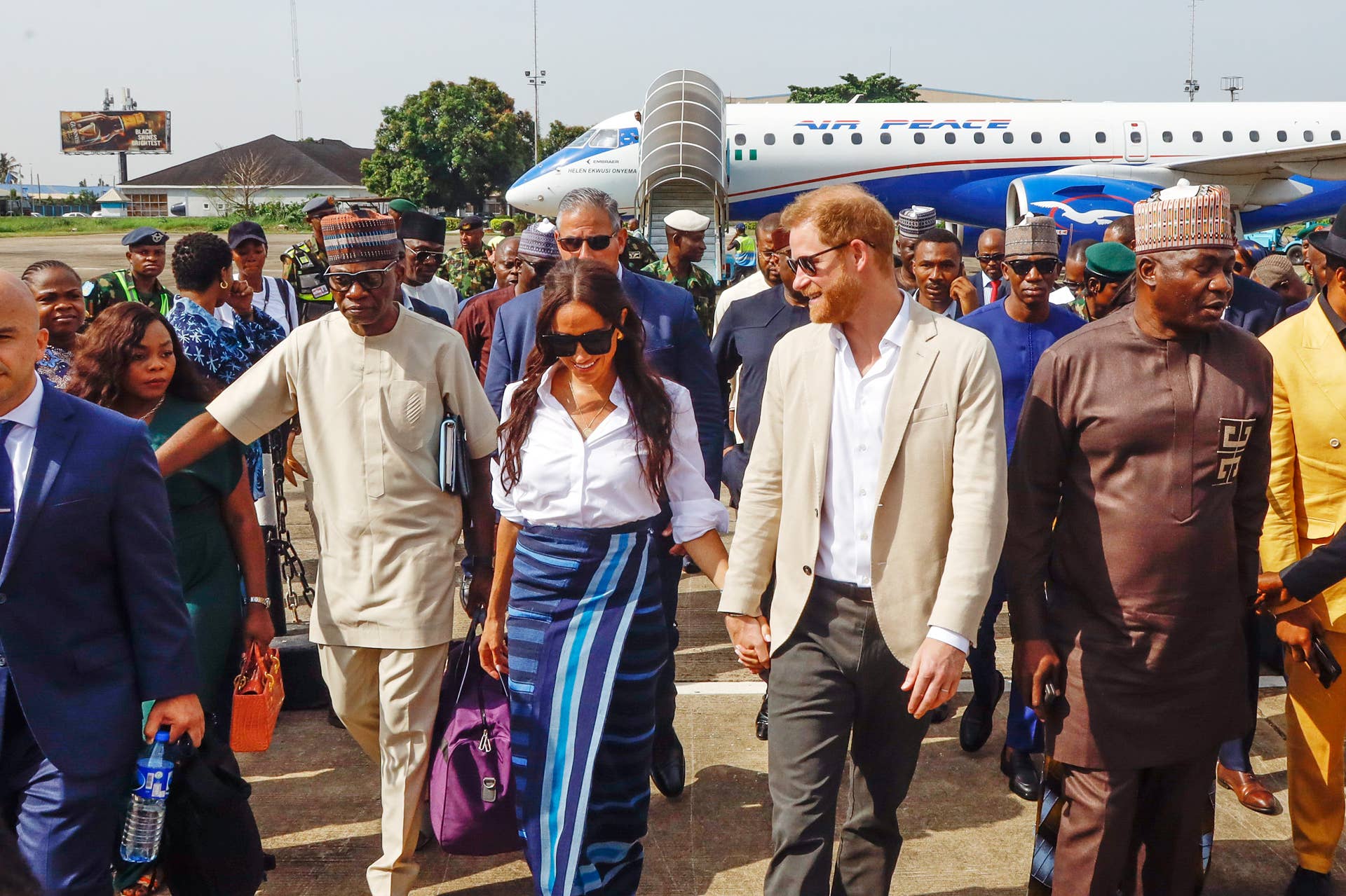 Everything Meghan Markle Wore on Her Tour of Nigeria - Fashionista