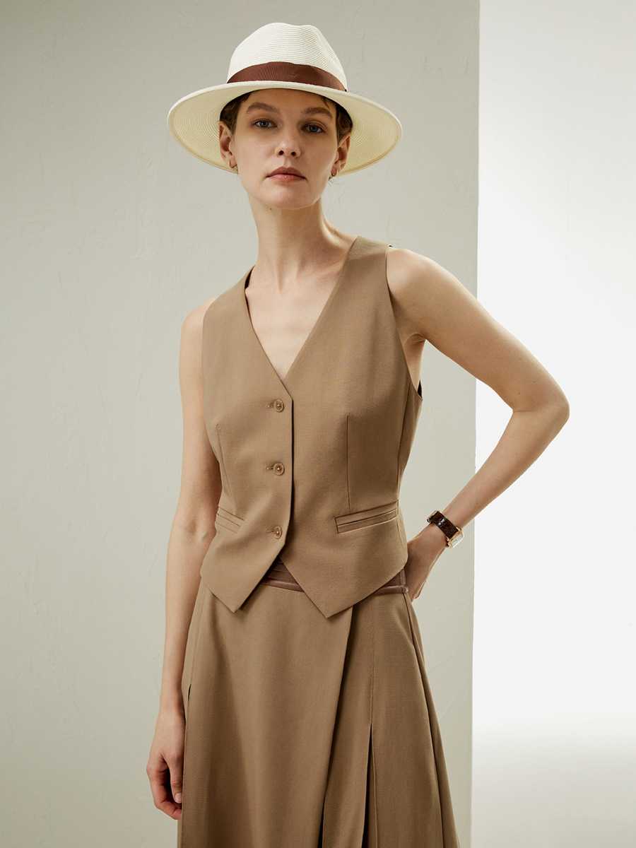 Ace 'Corporate-Core' This Fall With a Tailored Vest - Fashionista